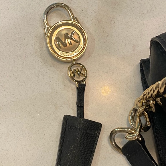 Michael Kors | Bags | Michael Kors Leather Purse With Lock And Key ...